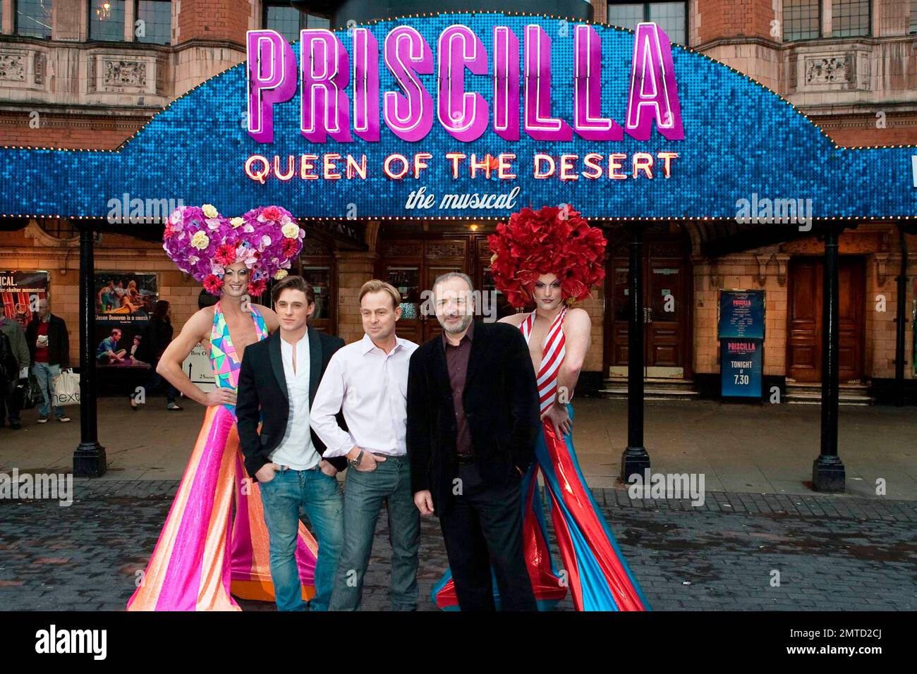 (L-R) Oliver Thornton, Jason Donovan and John Bowe pose with ...