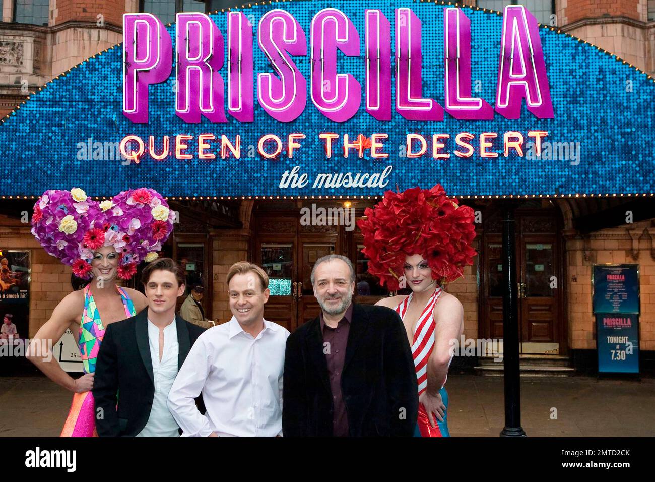 (L-R) Oliver Thornton, Jason Donovan and John Bowe pose with ...