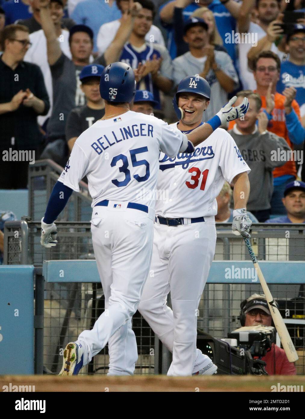 Los Angeles Dodgers' Cody Bellinger celebrates his home run with Joc ...