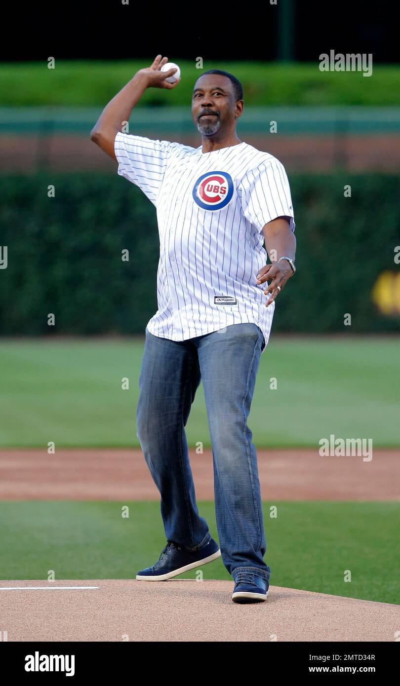 Nate Sutton throws out a ceremonial first pitch before a baseball game ...