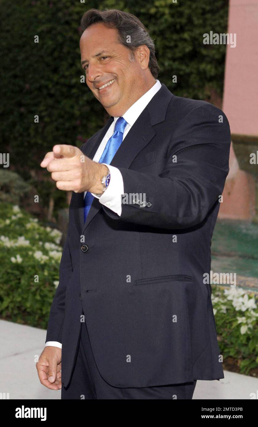 After a day of playing tennis comedian Jon Lovitz appears on the red ...