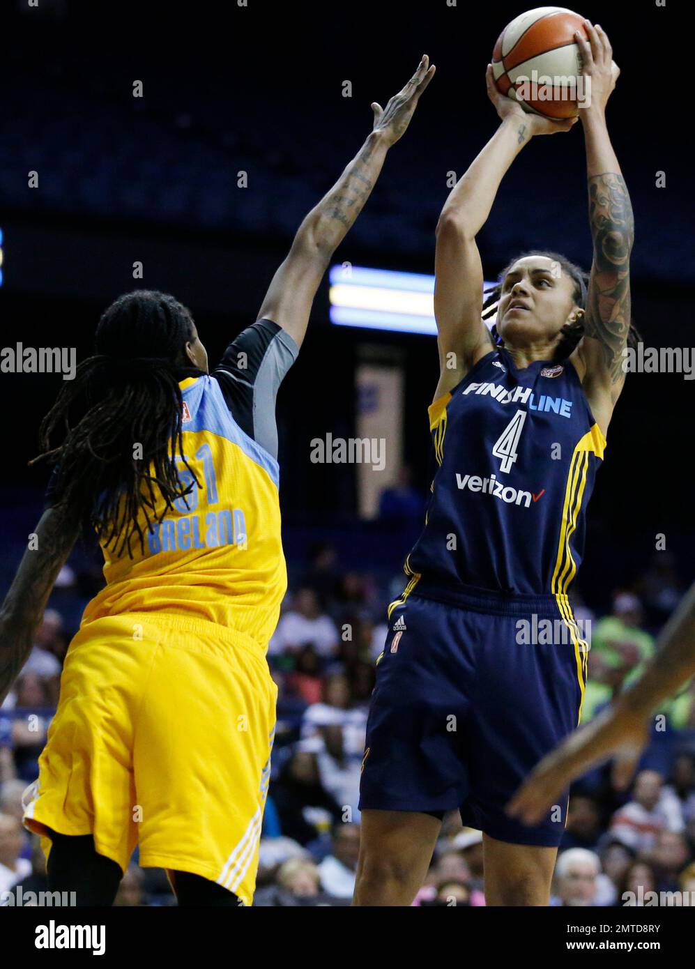 Indiana Fever forward Candice Dupree, right, shoots over Chicago Sky ...