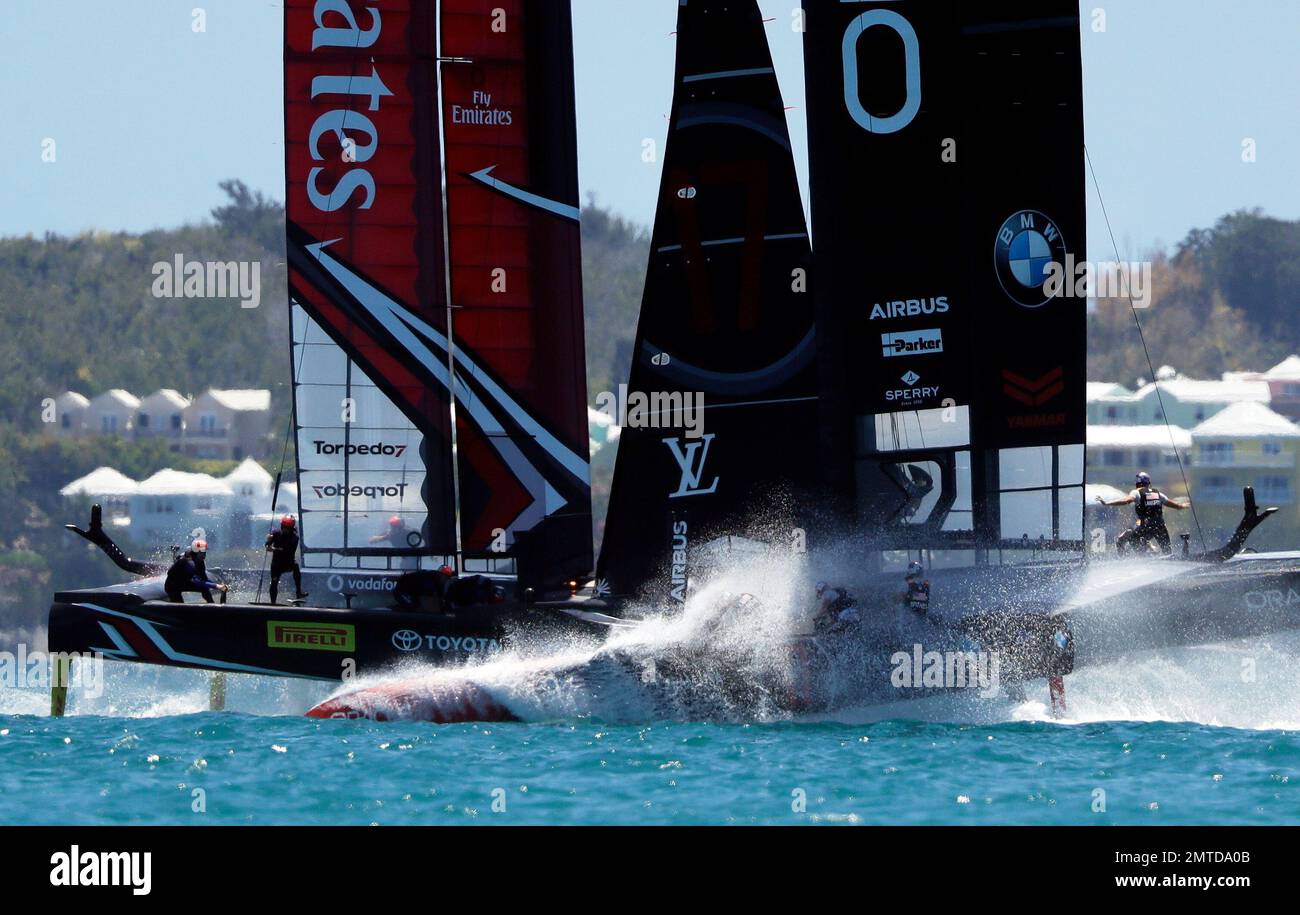 Oracle Team USA, right, and Emirates Team New Zealand, left, maneuver ...