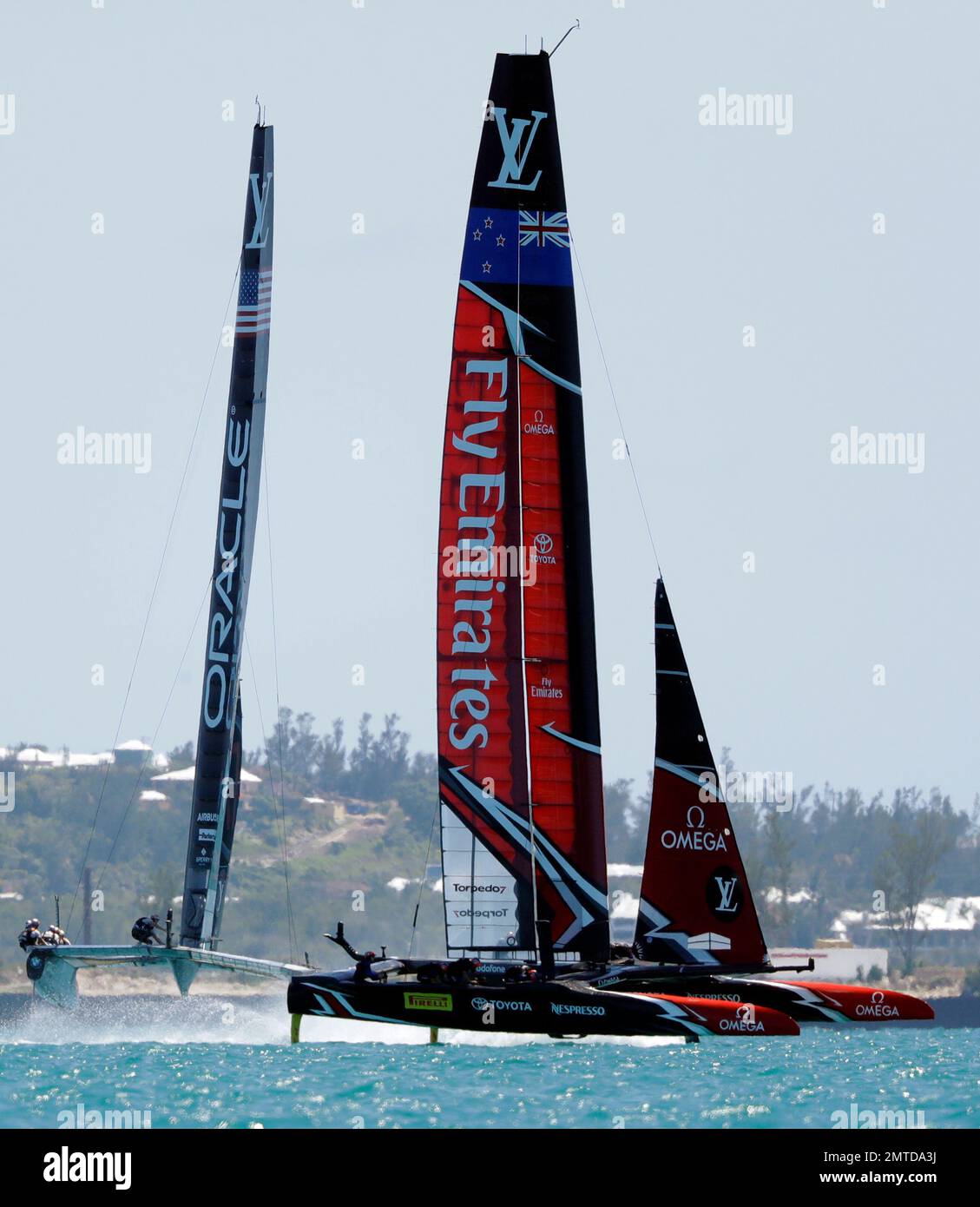 Emirates Team New Zealand races Oracle Team USA during the fourth race ...
