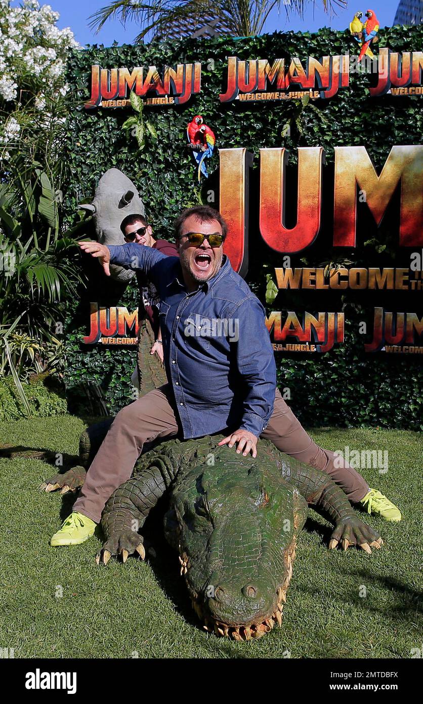 Actors Jack Black, right, and Nick Jonas pose to the media during a ...
