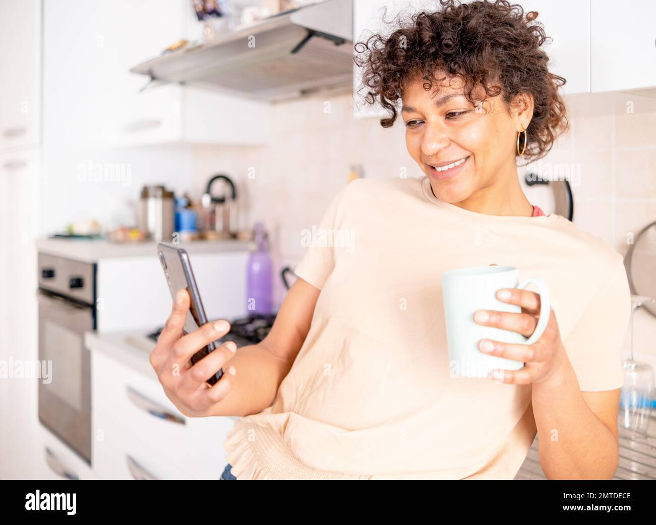 Woman scrolling phone hi-res stock photography and images - Alamy