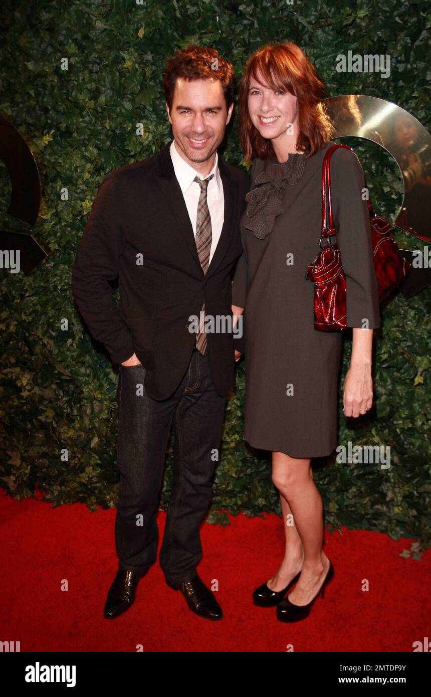 Eric McCormack and Janet Holden walk the red carpet at the QVC Red ...