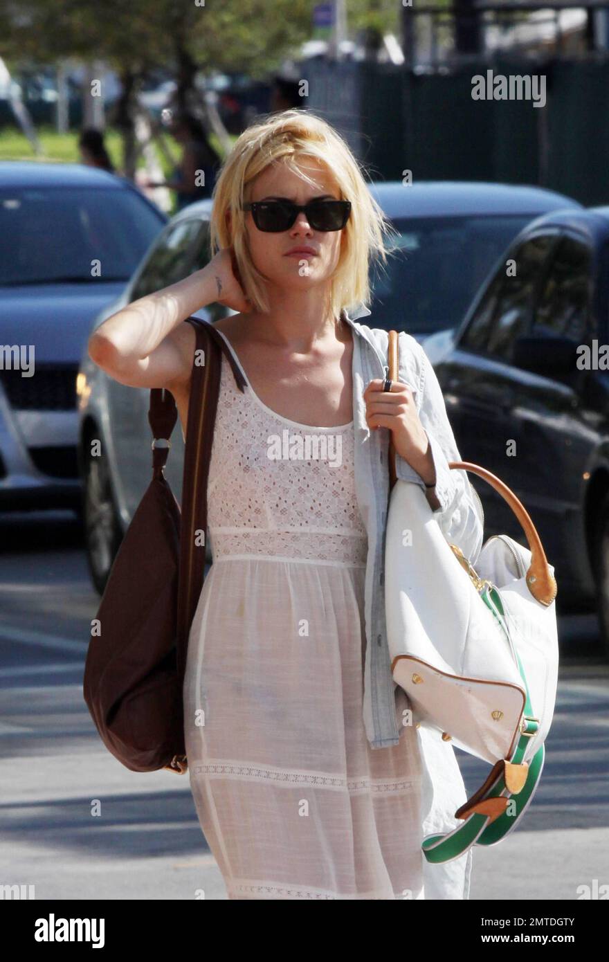 EXCLUSIVE!! Rachael Taylor wearing a bikini under her see thru white ...