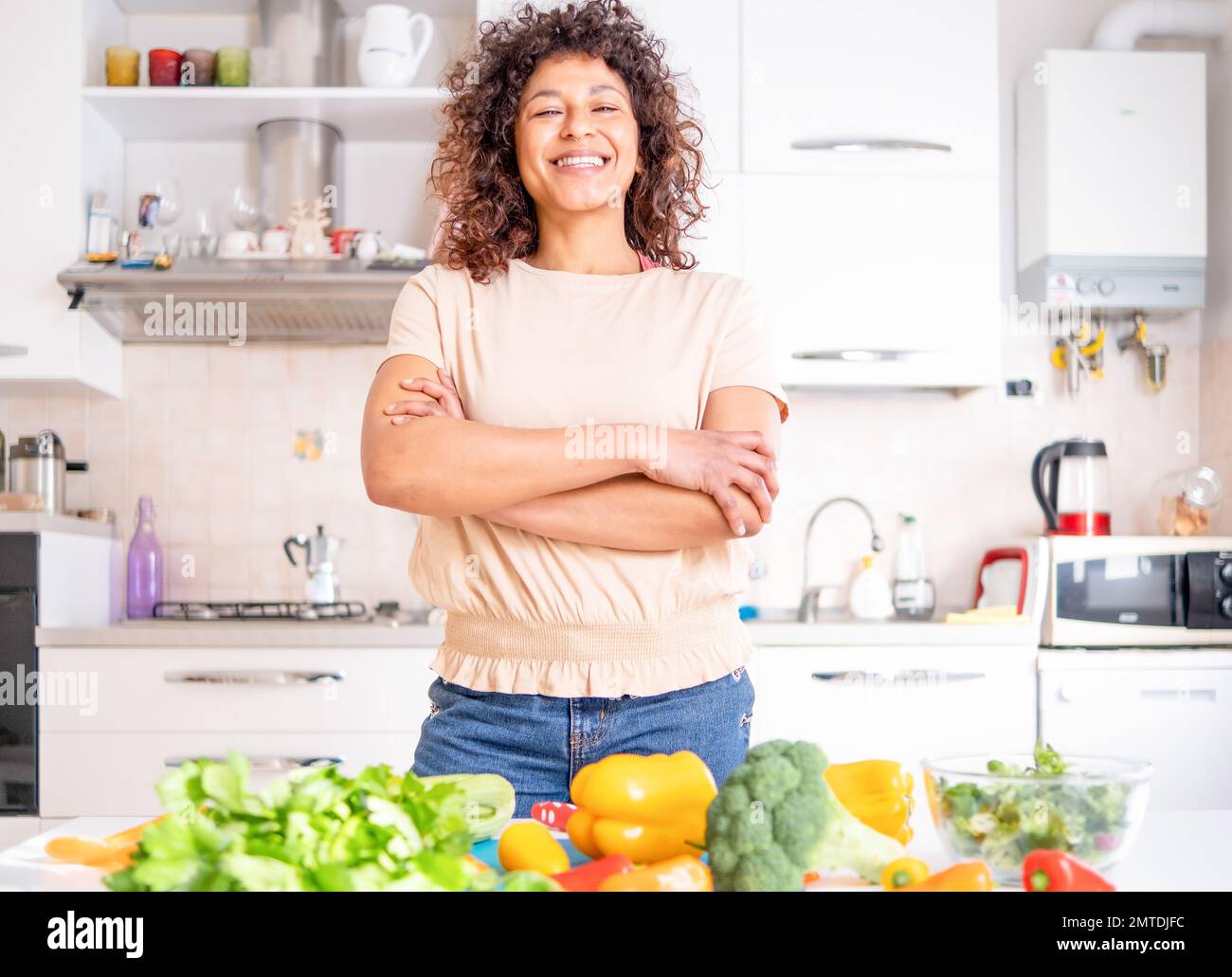 Woman cooking at home hi-res stock photography and images - Alamy