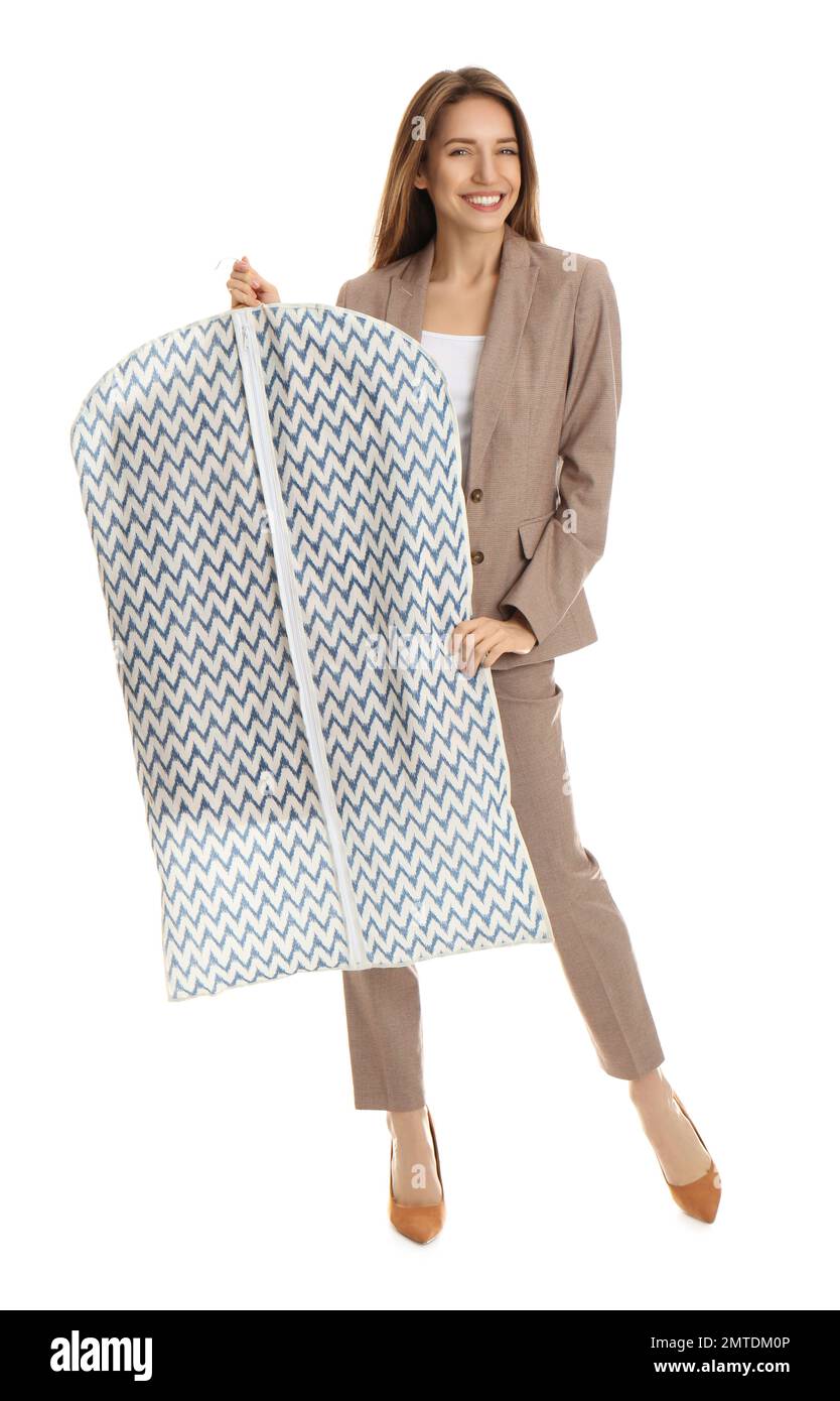 Young woman holding garment cover with clothes on white background. Dry ...