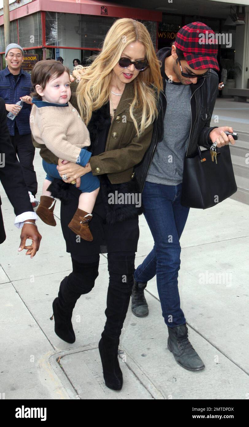 Celebrity stylist Rachel Zoe carries son Skyler as she and husband ...