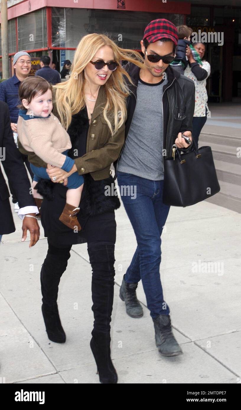 Celebrity stylist Rachel Zoe carries son Skyler as she and husband ...