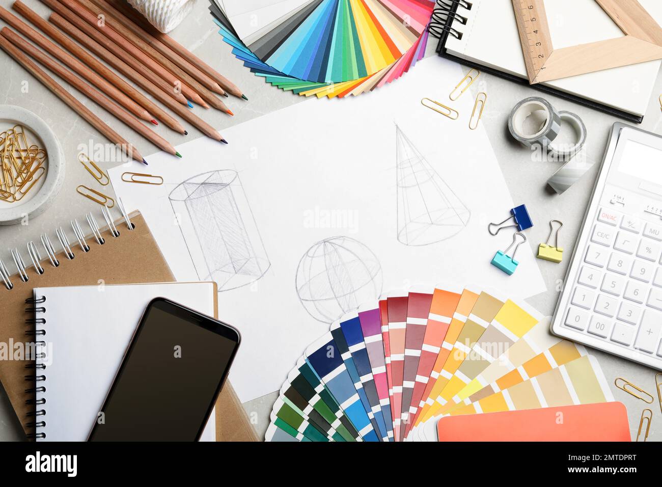 Flat lay composition with drawing of geometry shapes on table. Designer ...