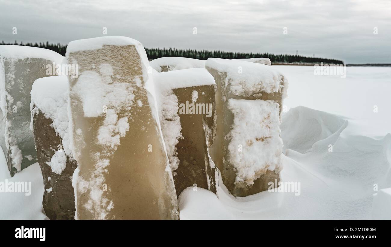 Pillars of ice for defrosting and eating stands covered with heaps of ...