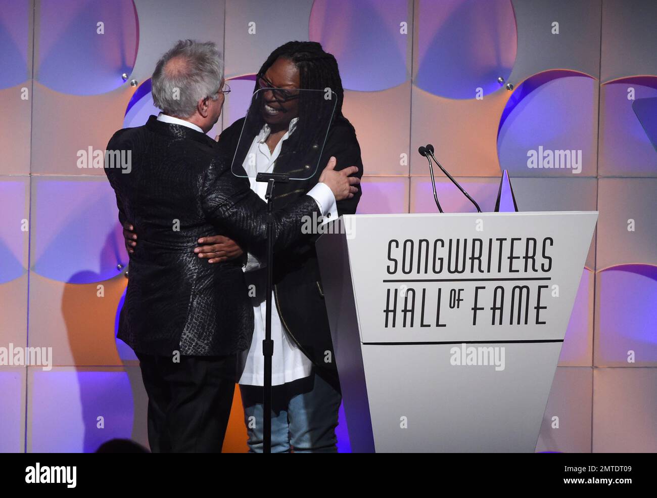 Whoopi Goldberg presents Alan Menken with the Johnny Mercer Award at the 48th Annual Songwriters ...