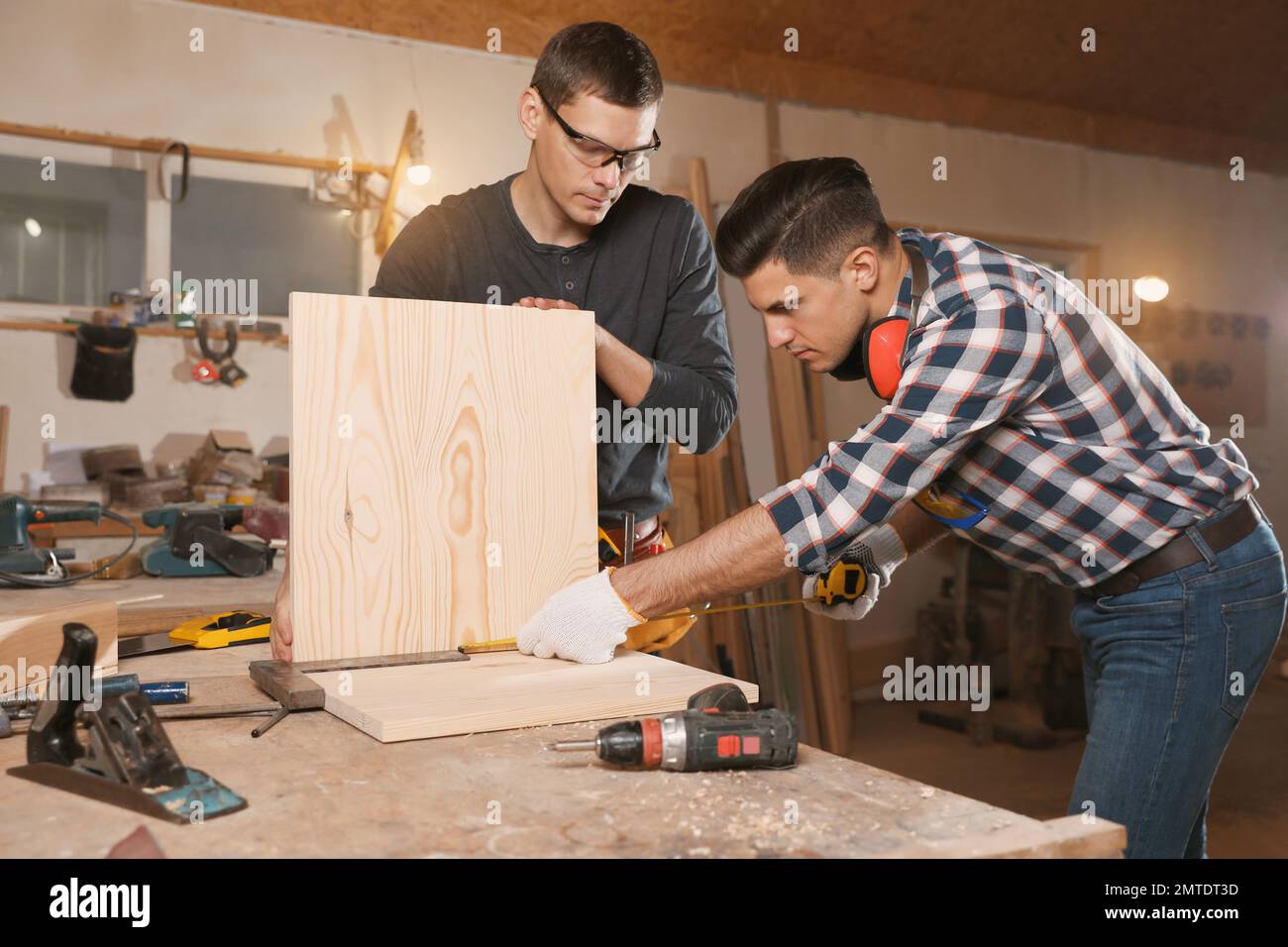 Professional man working wooden boards hi-res stock photography and ...