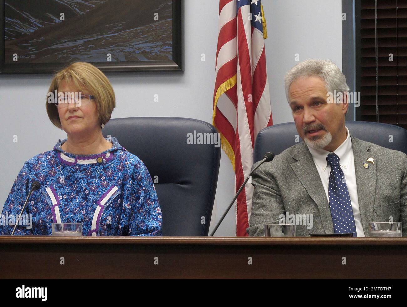 Alaska Senate President Pete Kelly, right, speaks to reporters next to ...