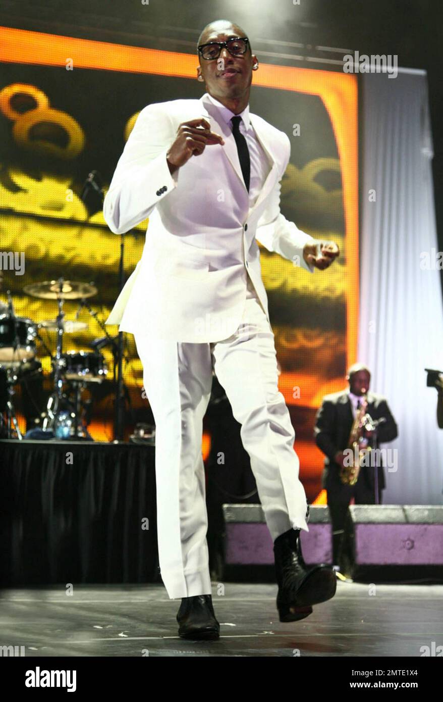 American R&B singer and record producer Raphael Saadiq looks sharp in a ...