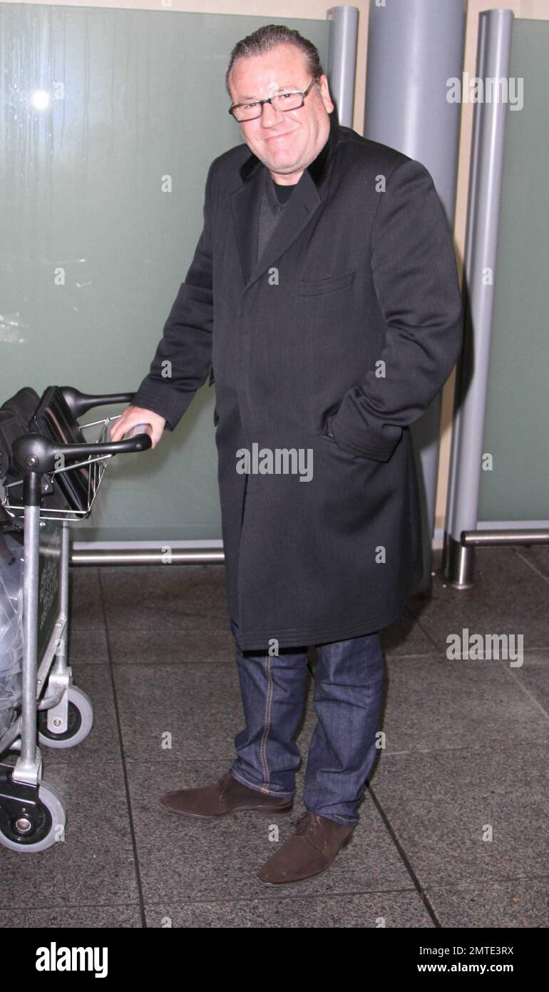 British actor Ray Winstone arrives at Heathrow Airport after a long ...