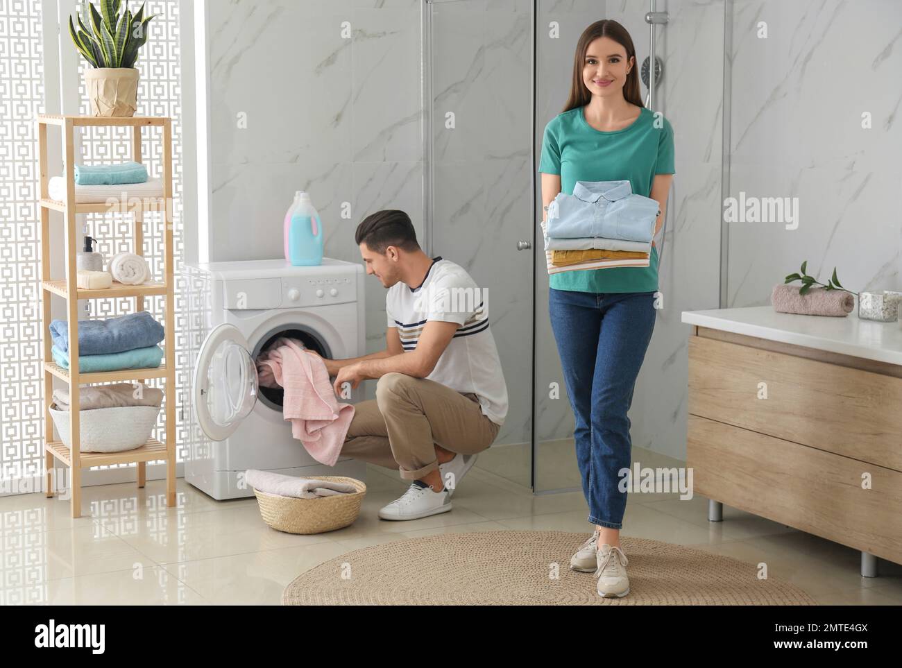 Family clean home woman wash clothes hi-res stock photography and ...