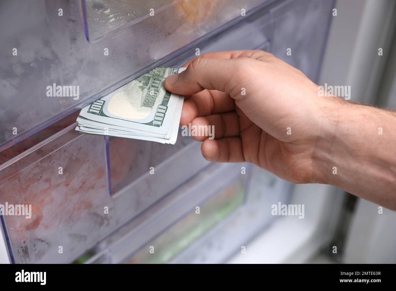 Money refrigerator hi-res stock photography and images - Alamy