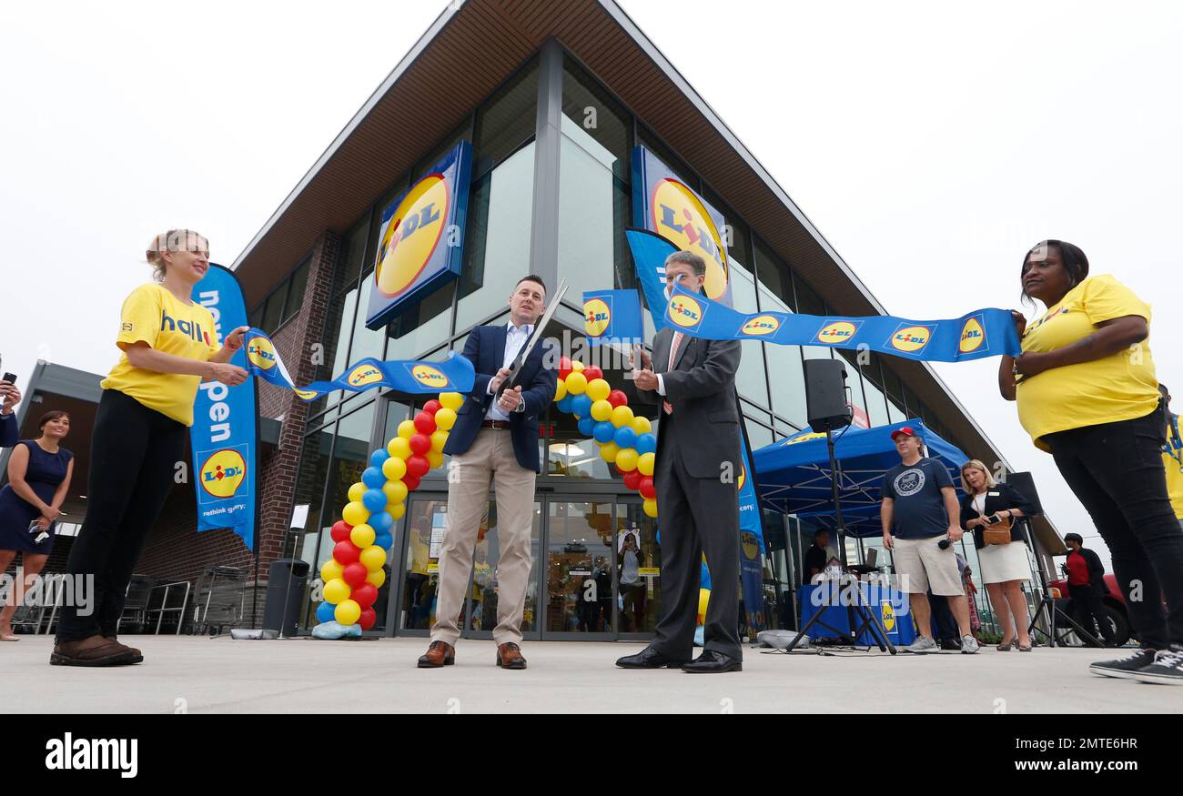 Brendan Proctor, the U.S. chief executive of Lidl, center left, and ...