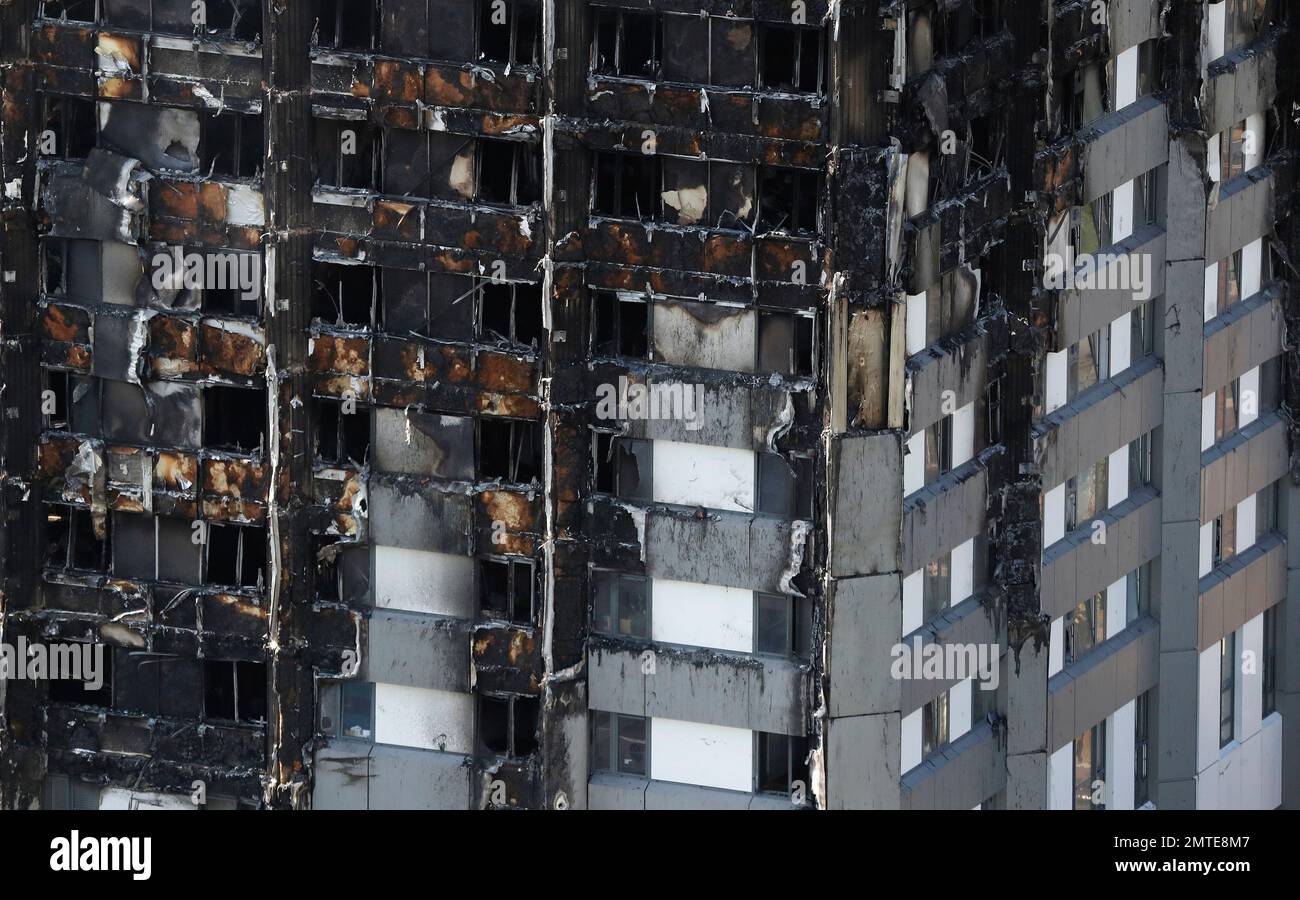 The fire-damaged Grenfell Tower stands in London, Thursday, June 15 ...