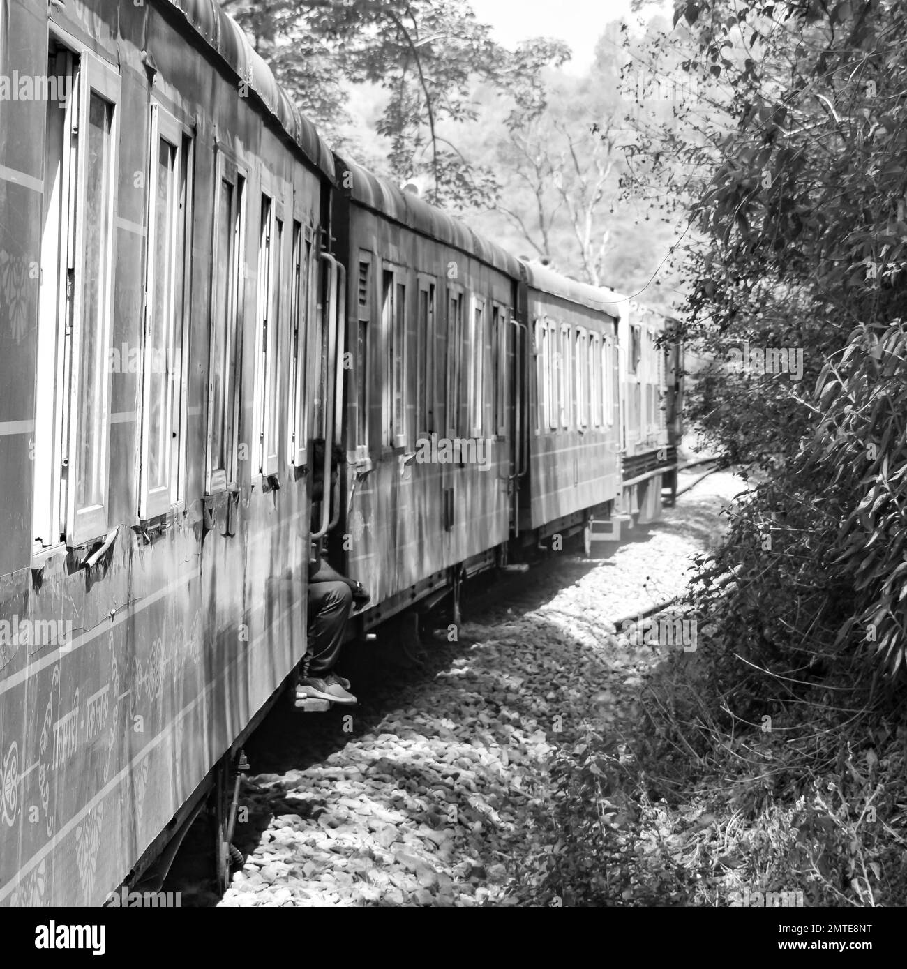 Toy Train moving on mountain slope, beautiful view, one side mountain ...