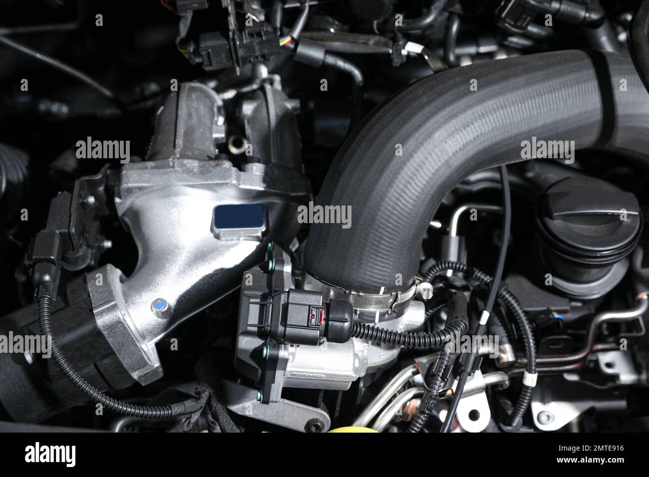Closeup view of engine bay in modern car Stock Photo - Alamy