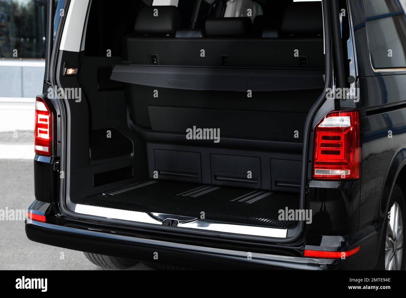 Modern car with open empty trunk outdoors Stock Photo - Alamy