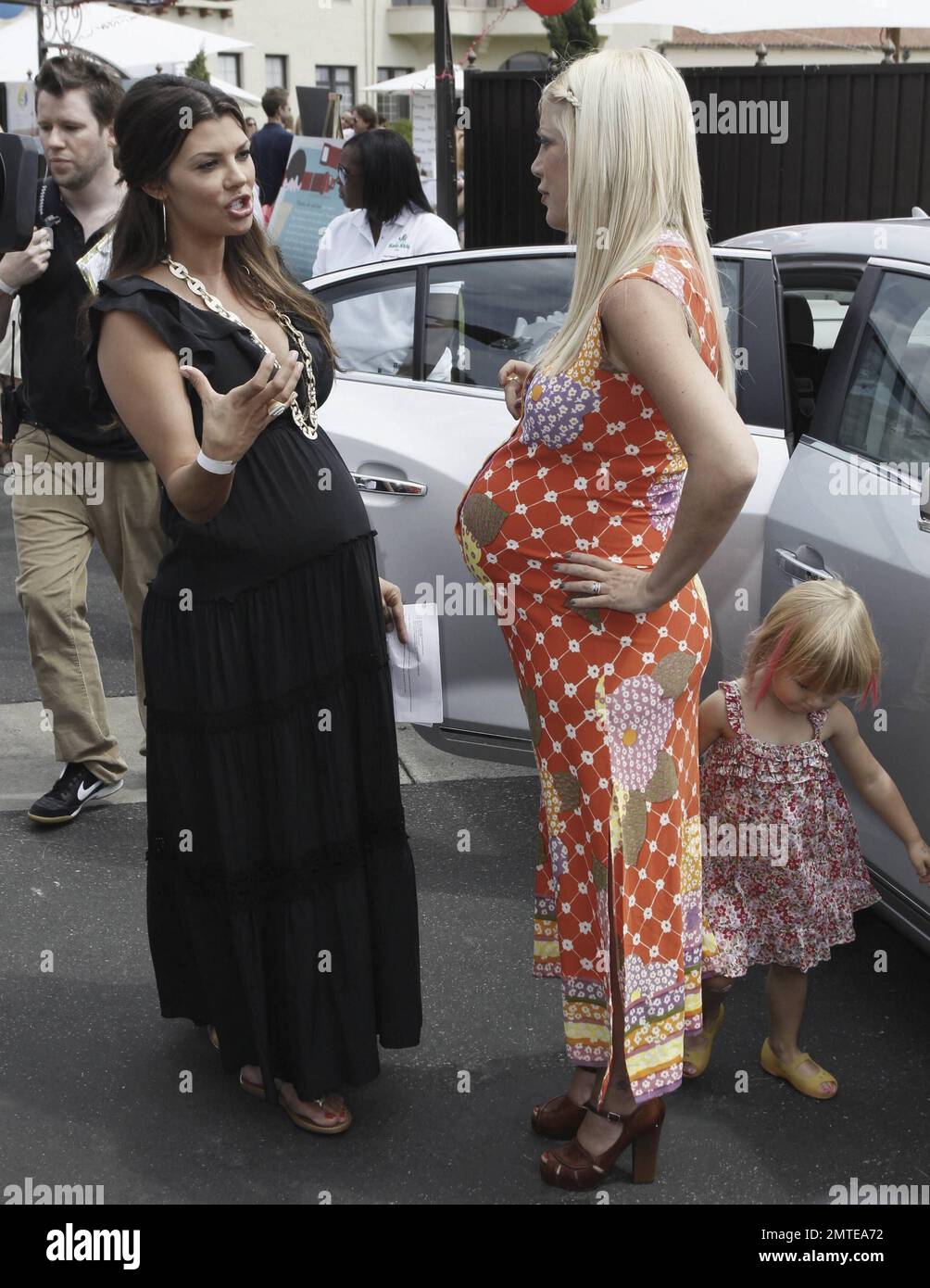Ali Landry and Tori Spelling attend the Red CARpet Event held at the ...