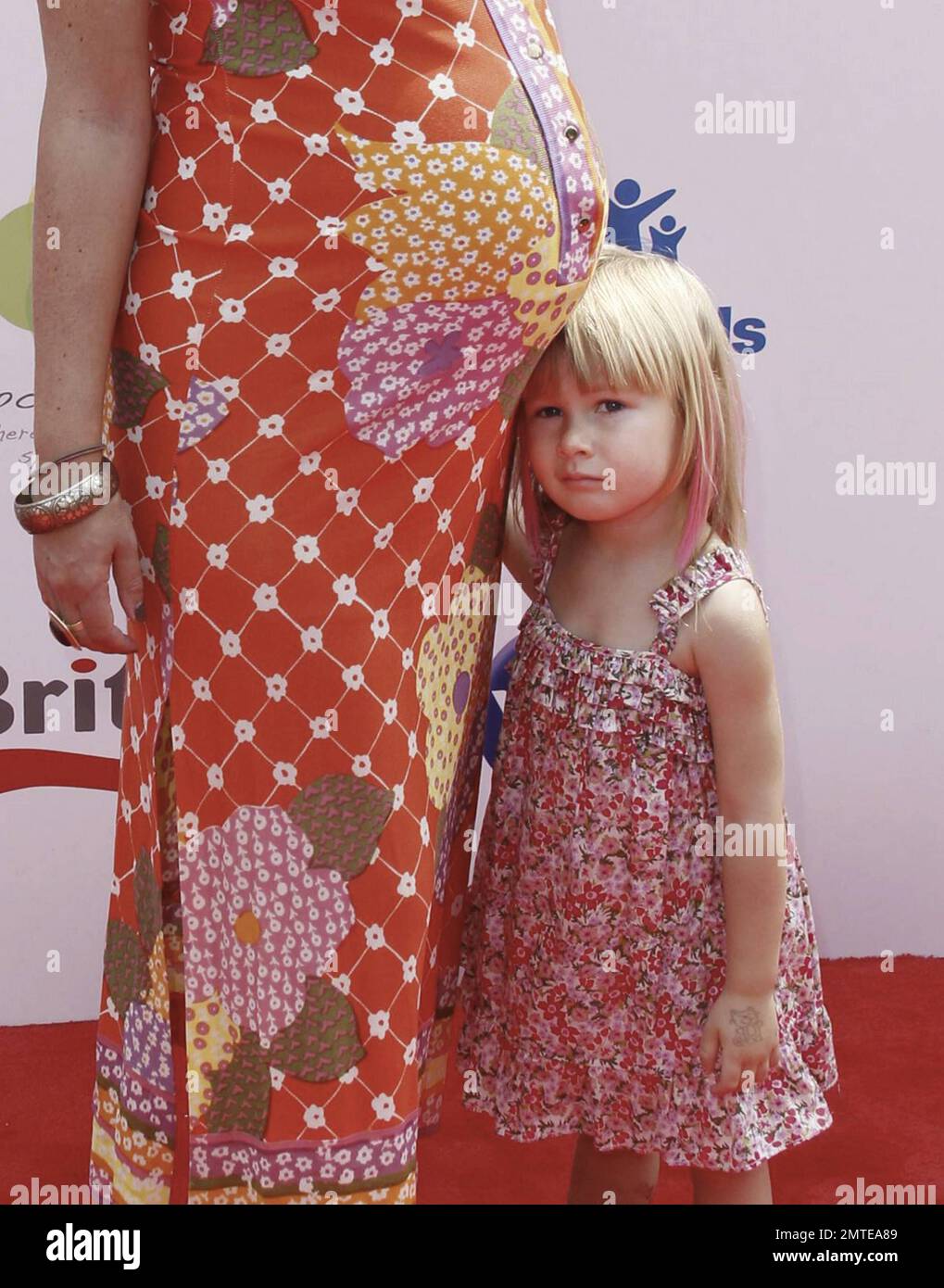 Tori Spelling and 3-year-old daughter Stella McDermott attend the Red ...