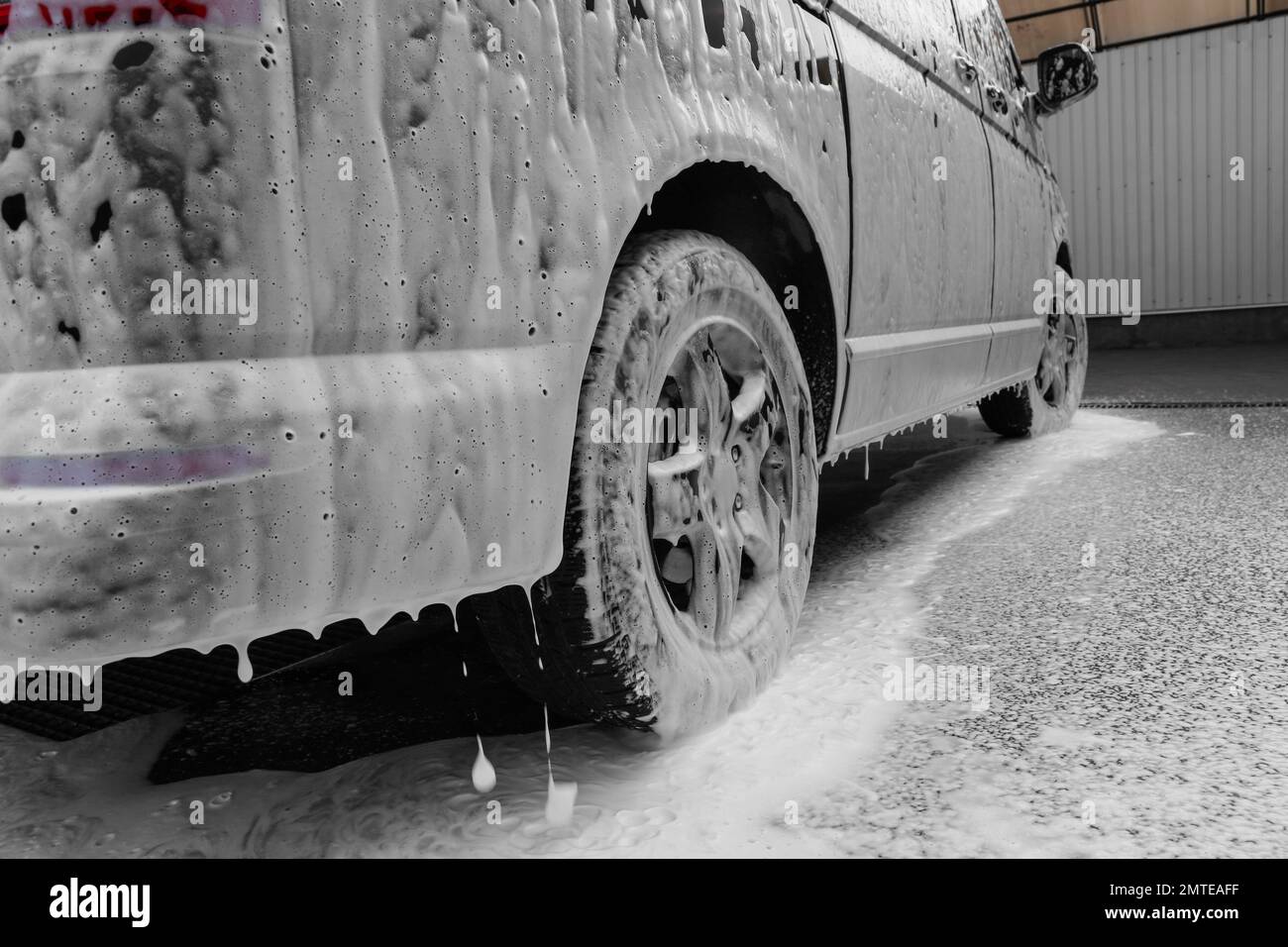 Modern automobile covered with foam at car wash, closeup Stock Photo ...