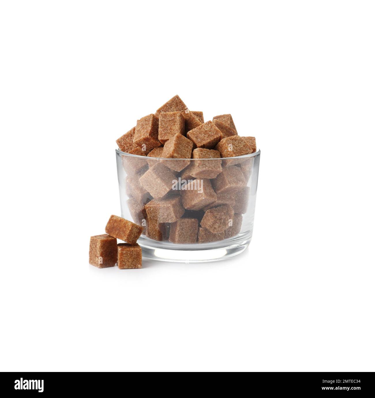 Glass bowl with brown sugar cubes isolated on white Stock Photo - Alamy
