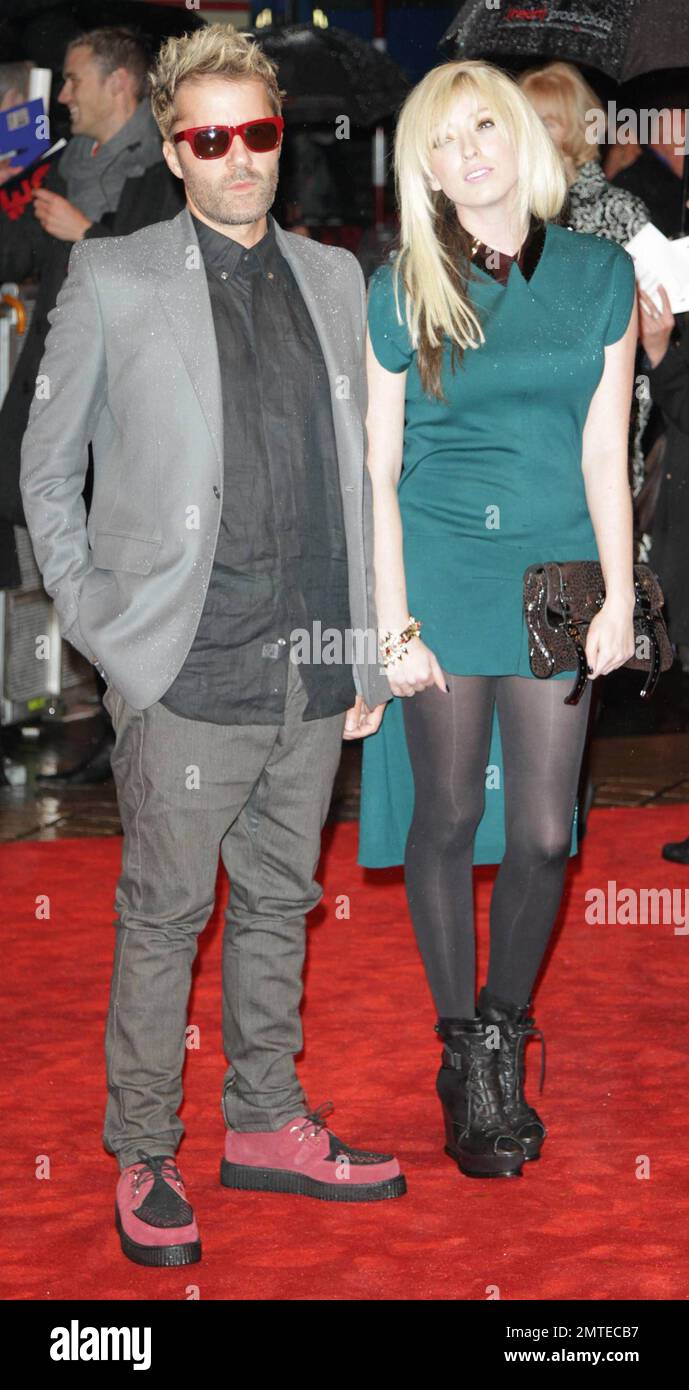 Jules De Martino and Katie White of The Ting Tings walk the red carpet ...