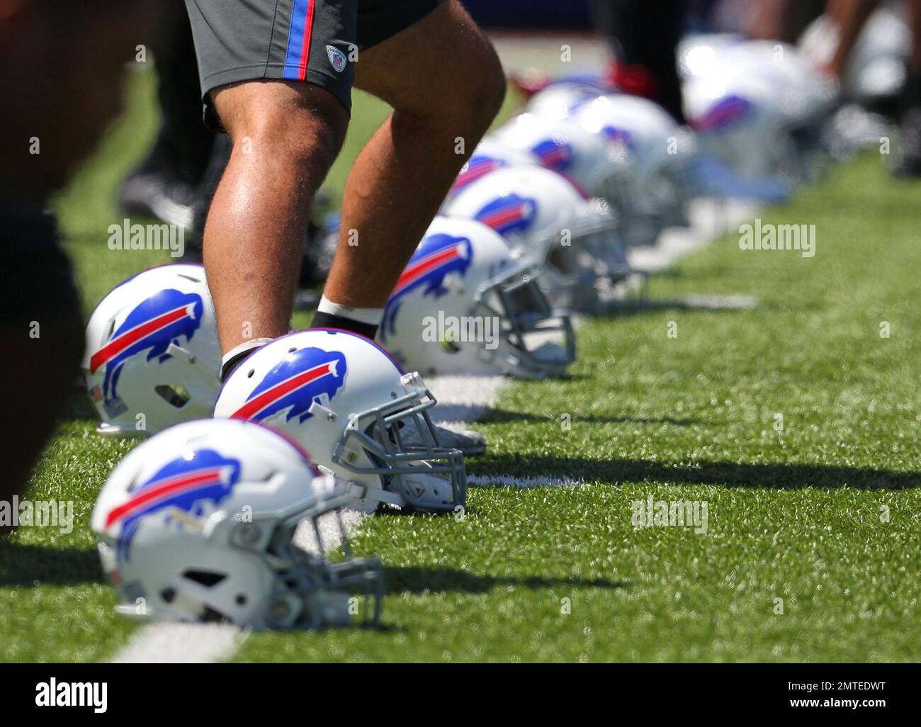 Buffalo Bills helmets are lined up on the field during NFL football ...