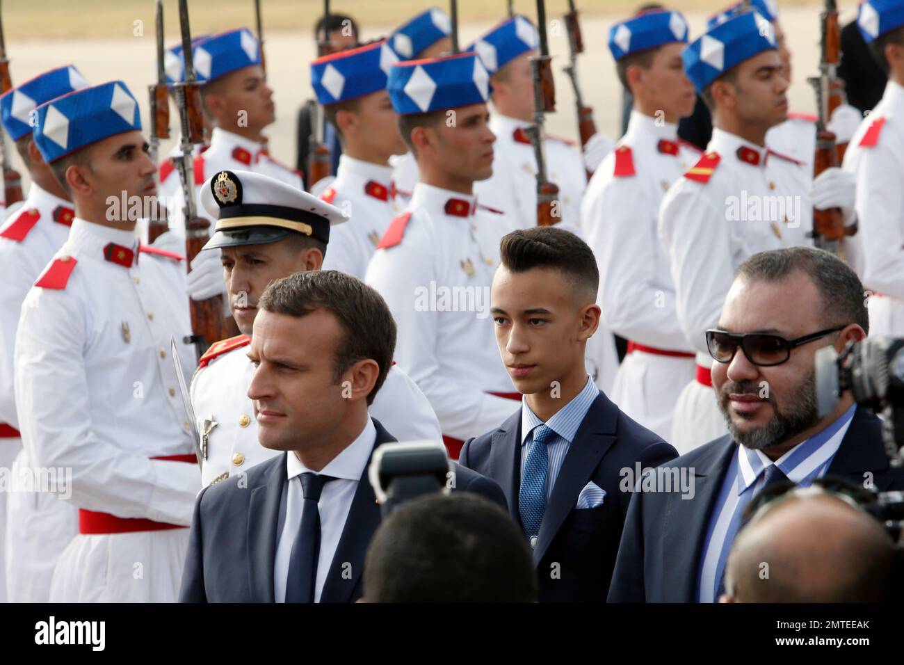 Morocco's King Mohammed VI, right, followed by his son Crown Prince ...