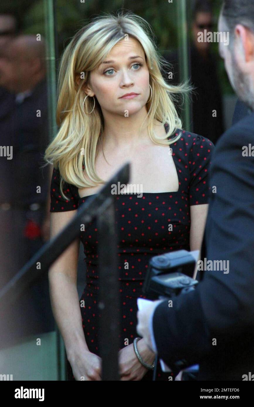 Clad in a classic polka dot afternoon dress and cherry red high heels, America's sweetheart ...