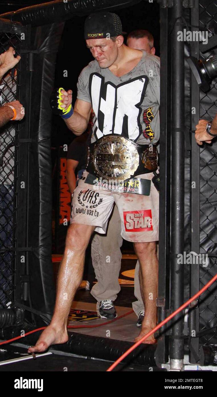 Former MMA fighter Alex Reid and opponent Tom 'Kong' Watson fight it ...