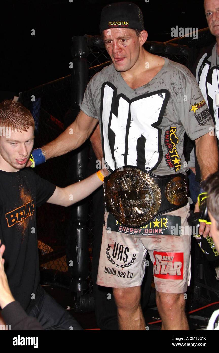 Former MMA fighter Alex Reid and opponent Tom 'Kong' Watson fight it ...