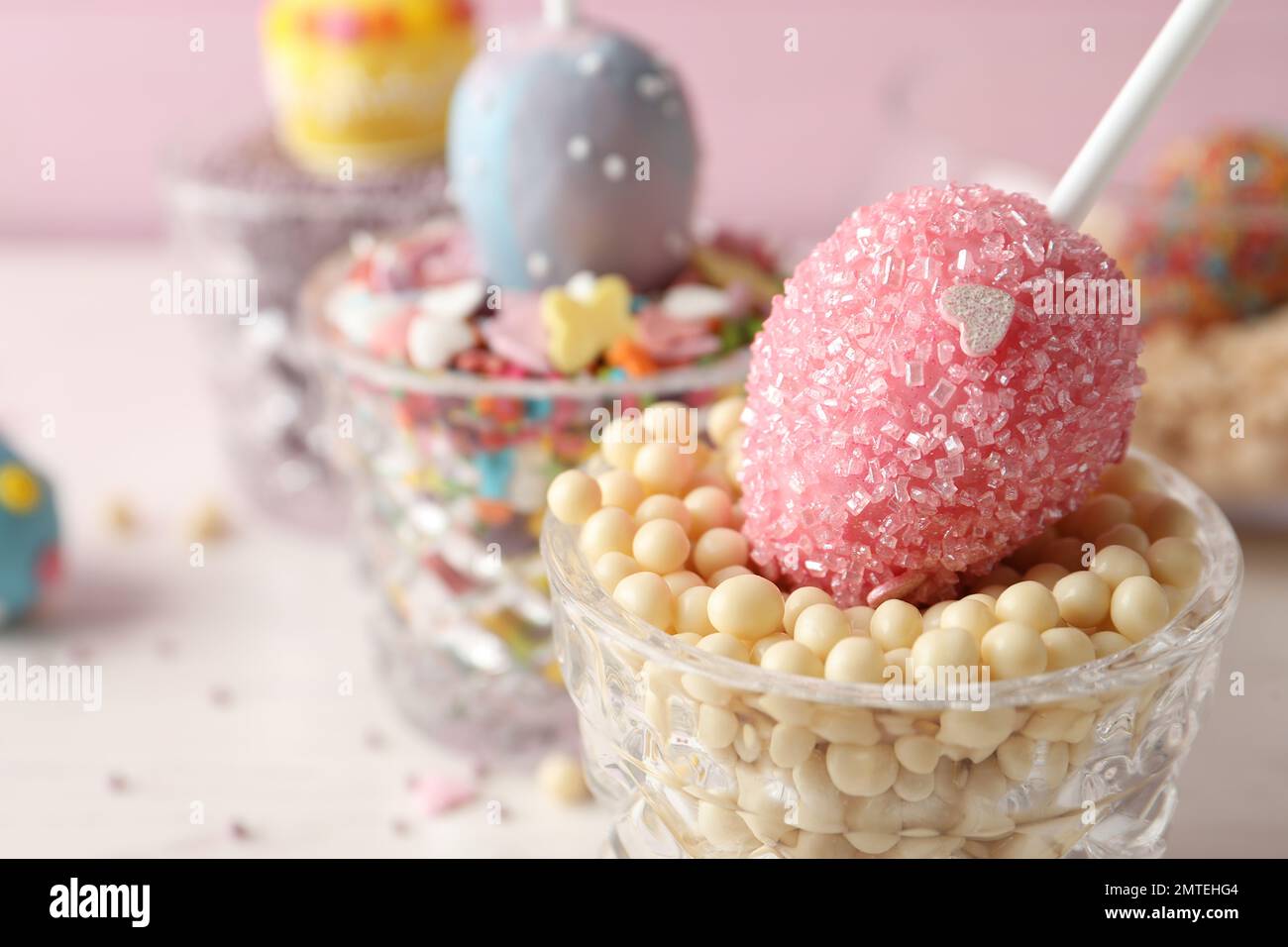 Egg shaped cake pop on table, closeup with space for text. Easter ...