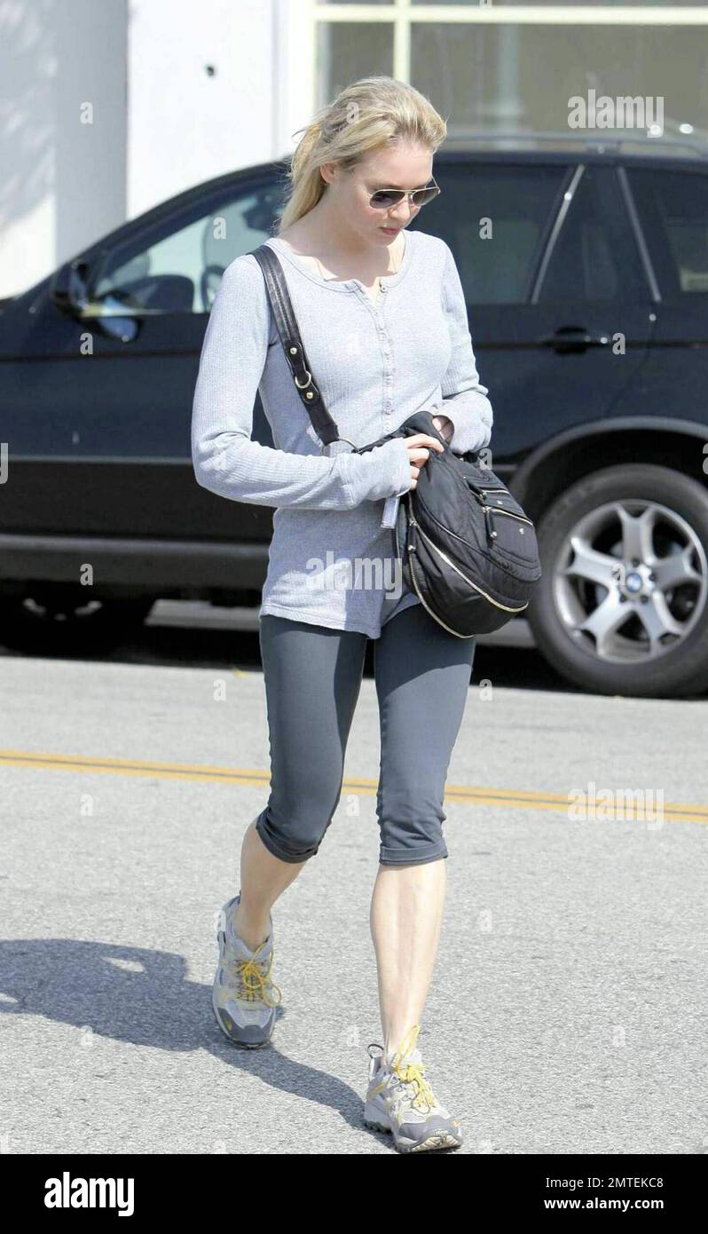 Renee Zellweger heads to her car after a salon visit. Zellweger, who is ...