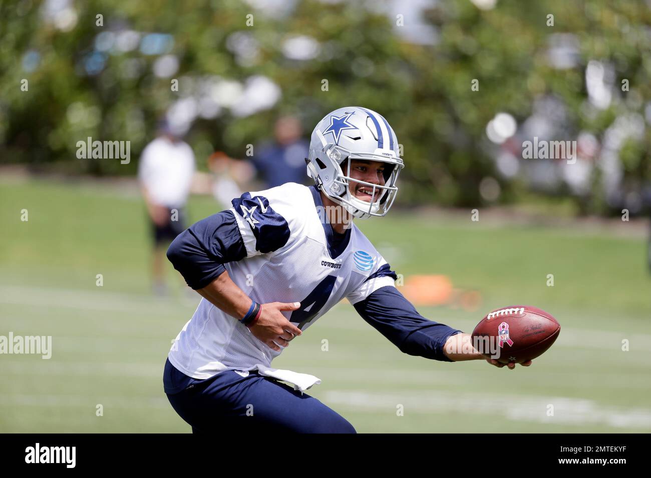 Dallas Cowboys quarterback Dak Prescott hands the ball off during an ...