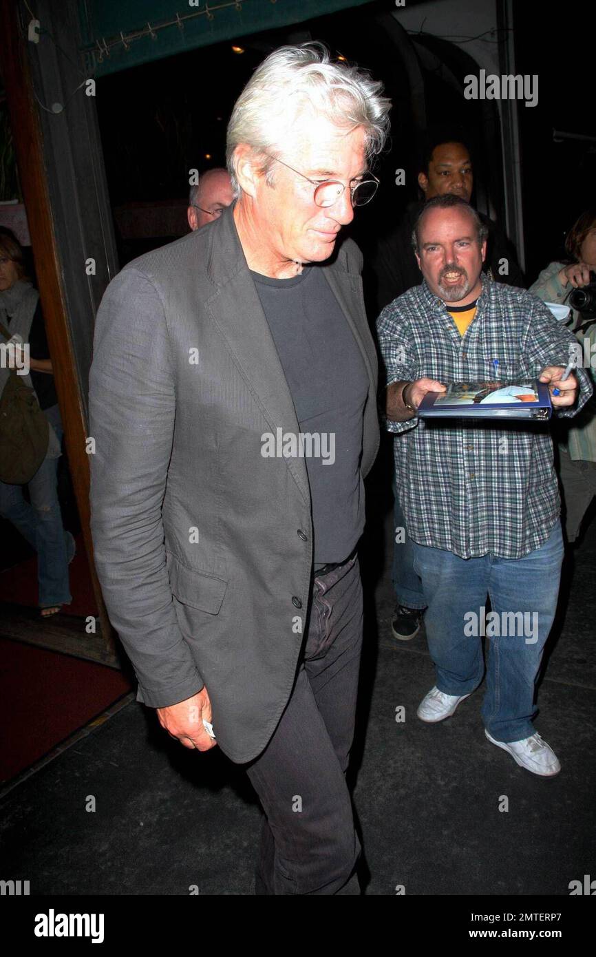 Actor Richard Gere and wife Carey Lowell leave the restaurant Madeo in ...