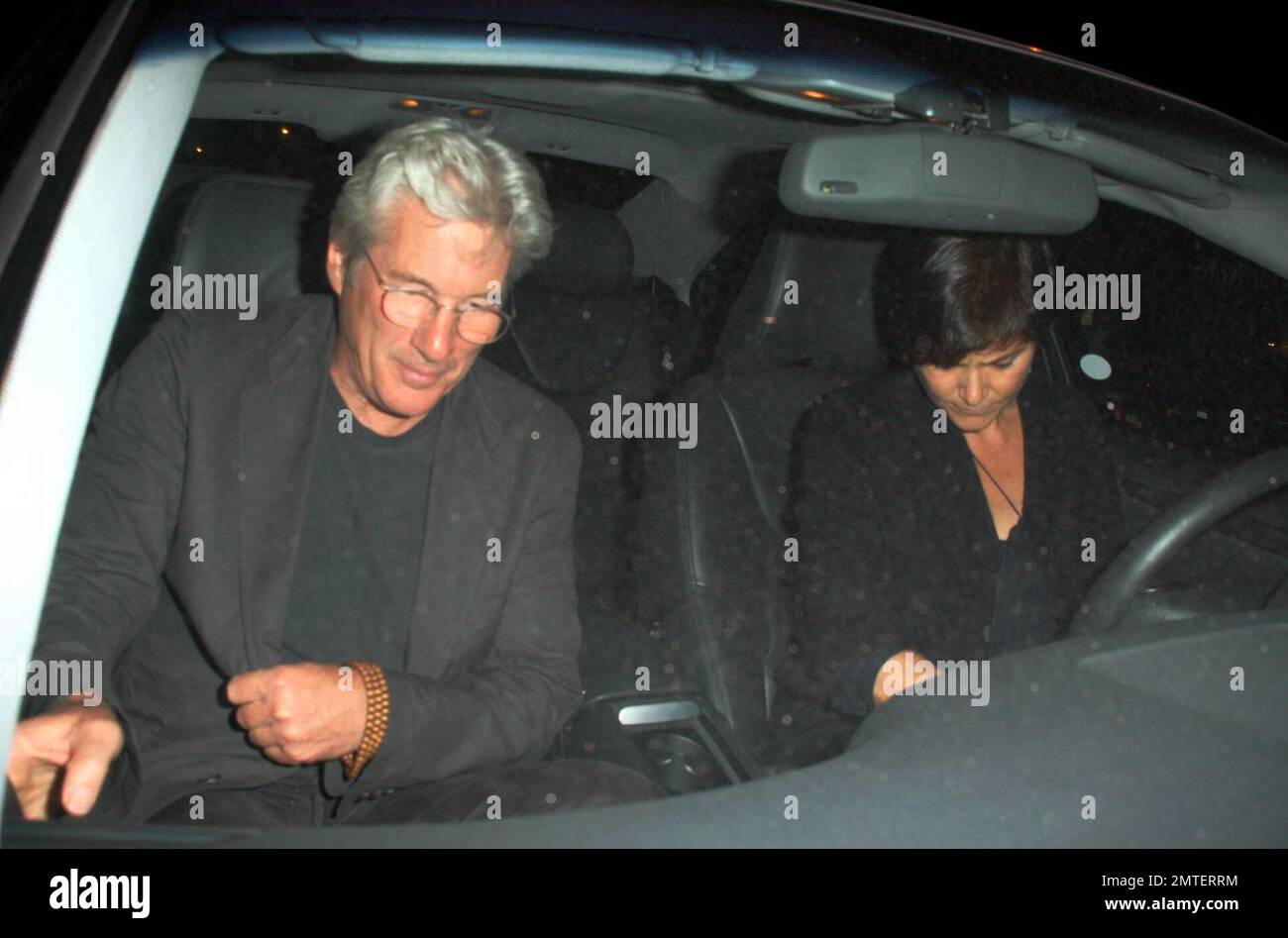 Actor Richard Gere and wife Carey Lowell leave the restaurant Madeo in ...