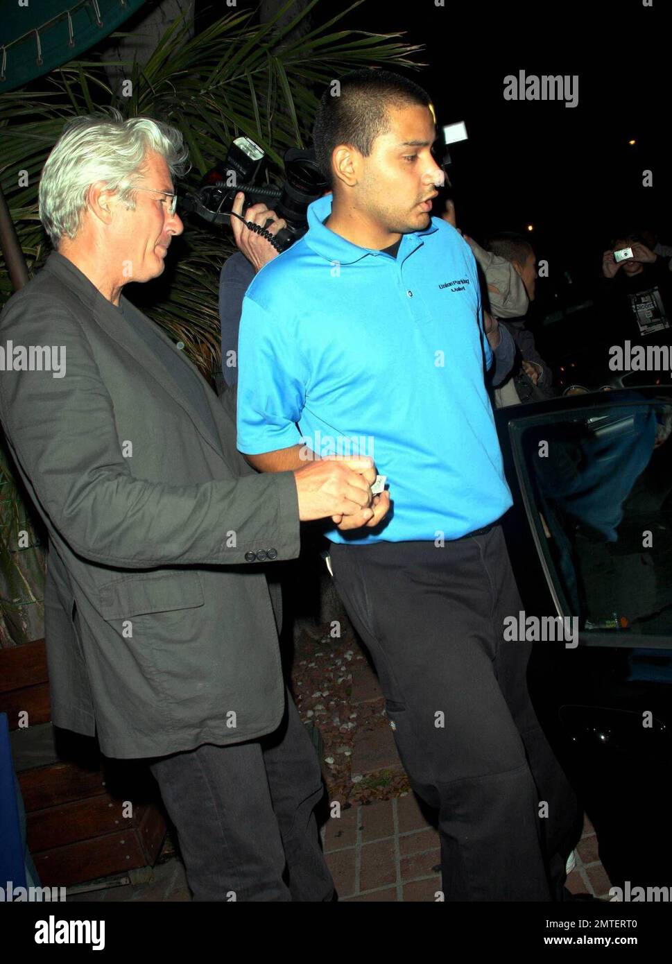 Actor Richard Gere and wife Carey Lowell leave the restaurant Madeo in ...