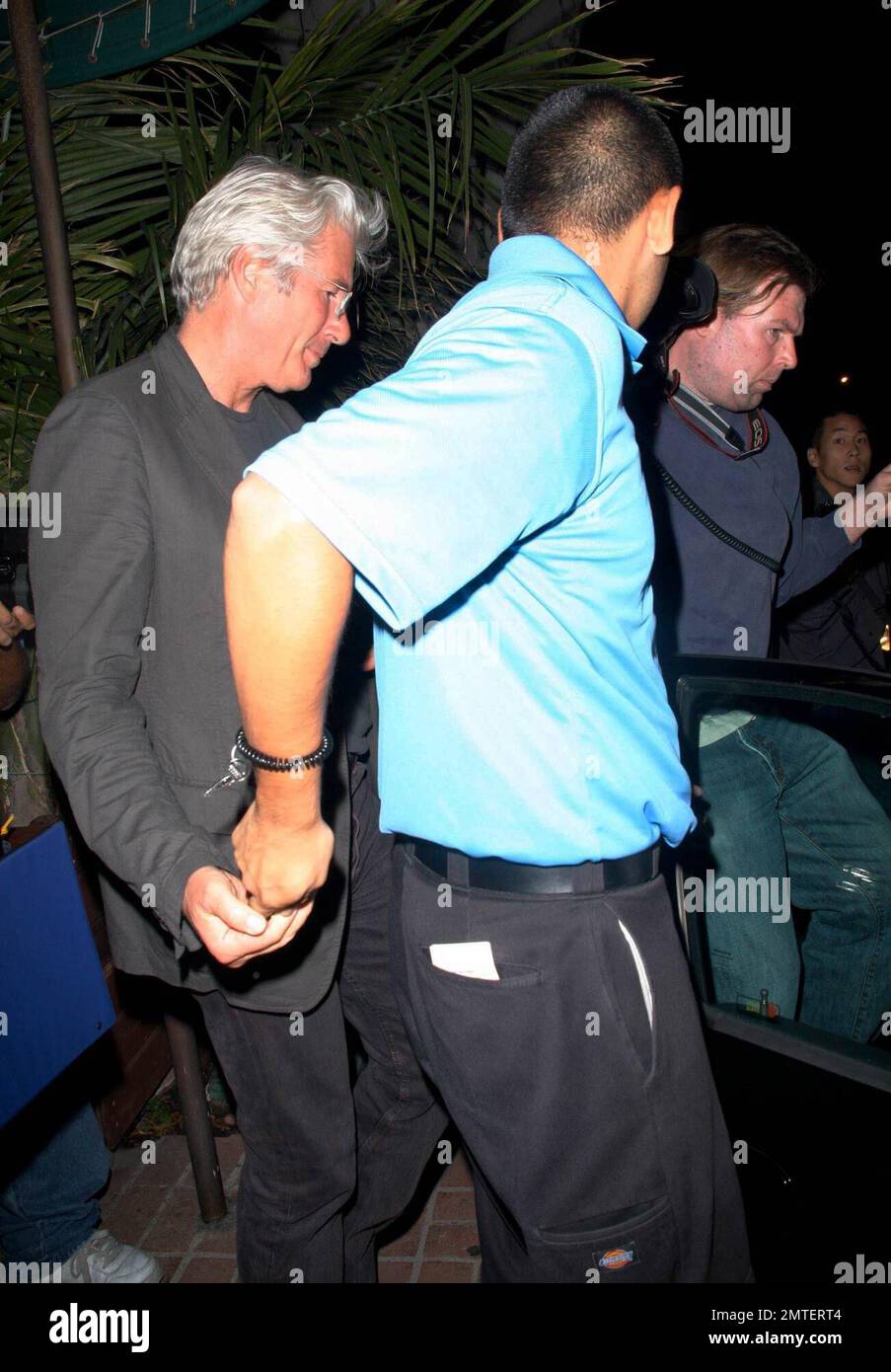 Actor Richard Gere and wife Carey Lowell leave the restaurant Madeo in ...