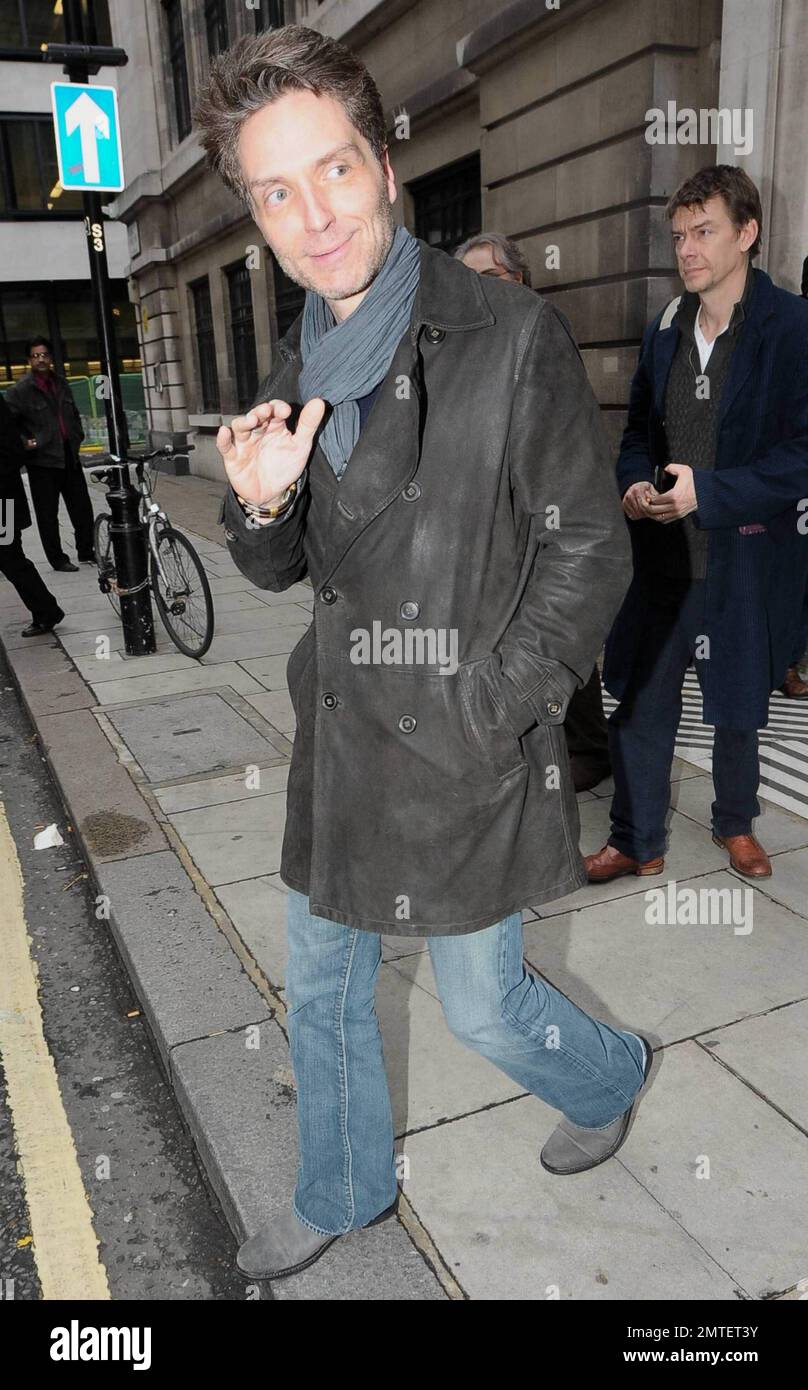 American singer Richard Marx waves to fans as he arrives at and later ...