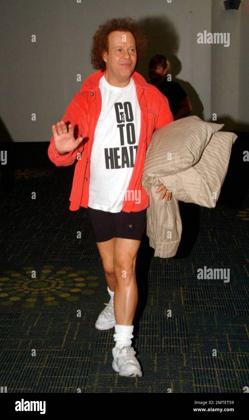 Exclusive!! Fitness guru Richard Simmons poses for photos with a friend ...