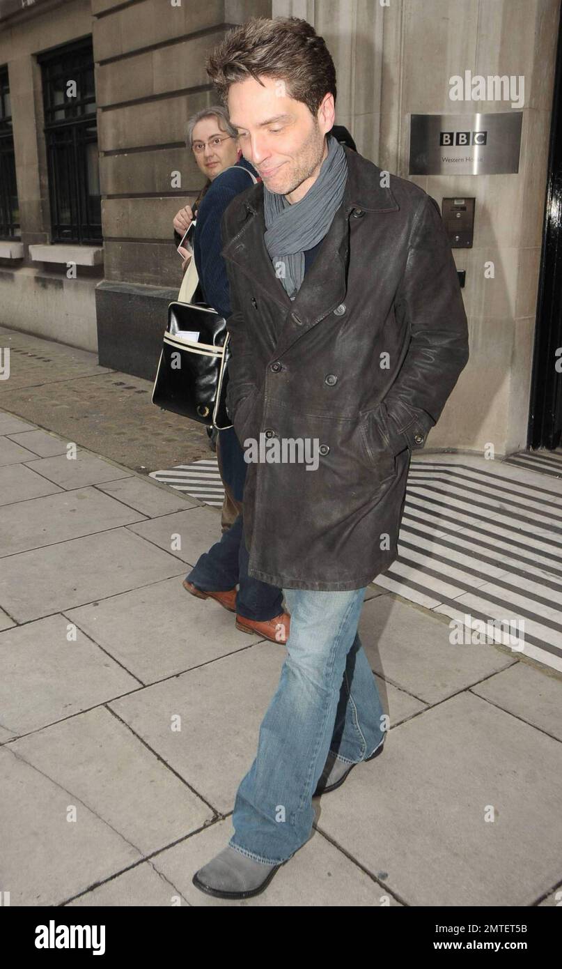 American singer Richard Marx waves to fans as he arrives at and later ...